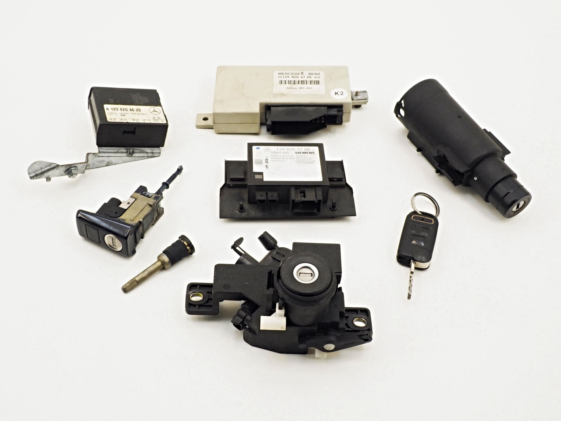 1298204126 - Steering ignition trunk door lock key set | 2219